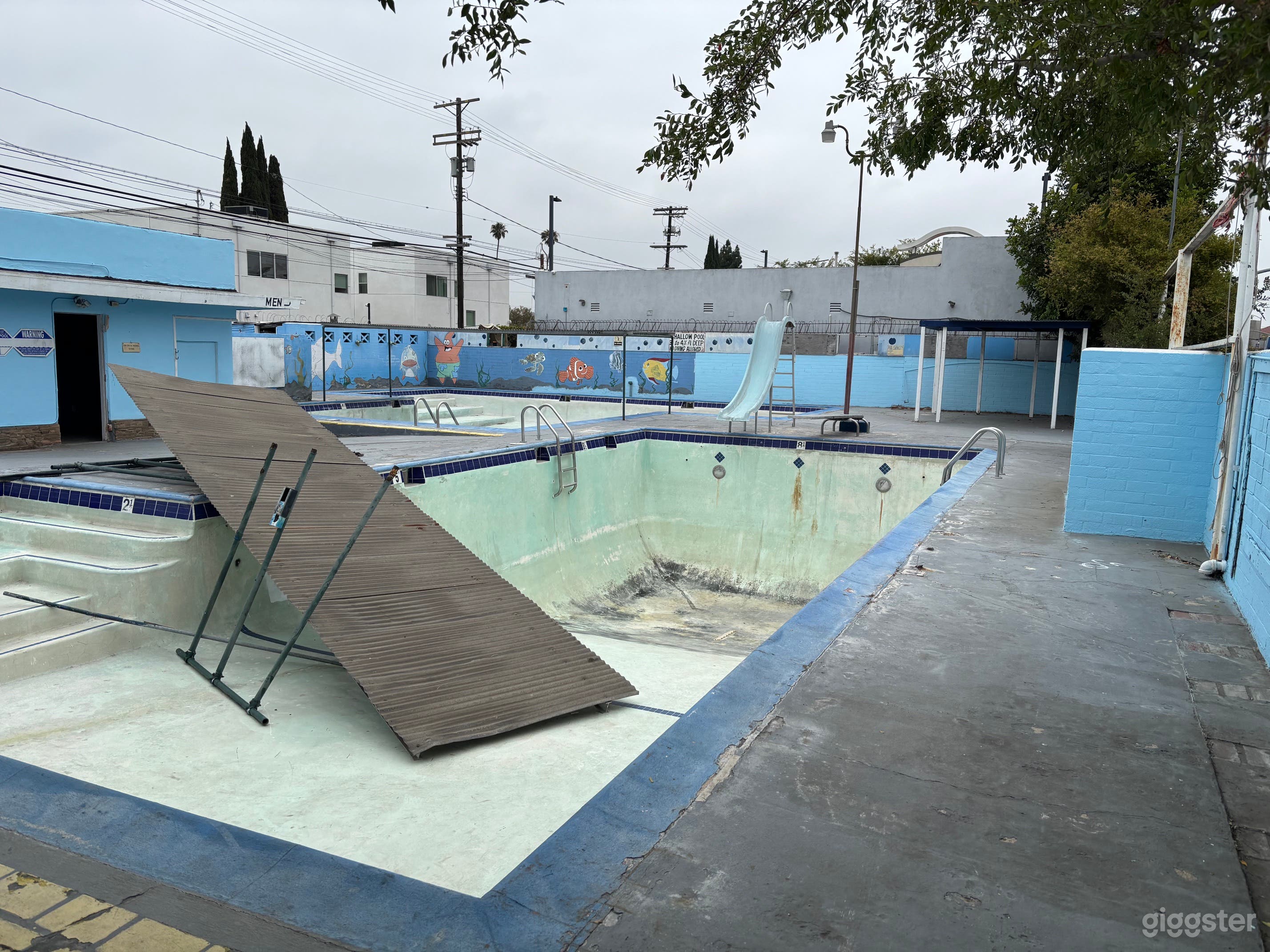 Abandoned Outdoor Pool Complex | Rent this location on Giggster